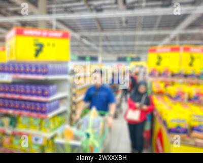 Inside a supermarket with shoppers. Blur or defocused for background ...