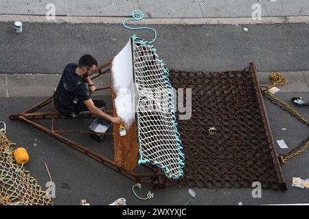 dredges are repaired in the harbour, the seabed is ploughed with ...