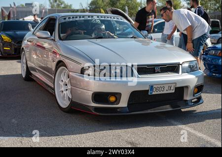 Front view of a silver Nissan Skyline GT-R33 ninth generation at a ...