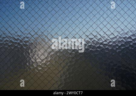 Translucent glass wallpaper with rhombus pattern Stock Photo - Alamy