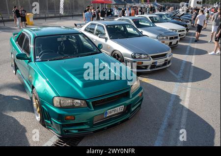 Nissan Skyline GT R34 tenth generation green in a Japanese car meet ...