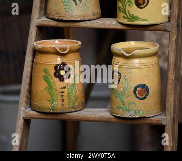 Antique Alsatian glazed pottery pitchers with old farmhouse motifs on ...