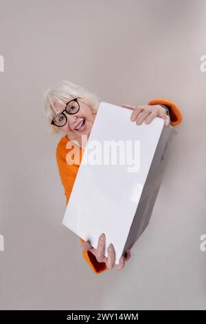 Middle age senior hispanic woman over isolated background showing and ...