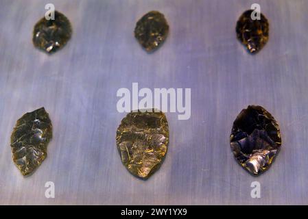Neolithic obsidian arrowhead on white background Stock Photo - Alamy