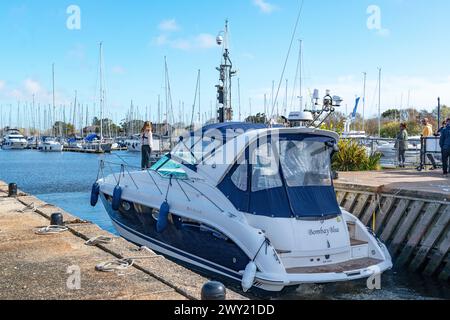 Motor yacht leaving Chichester Yacht Marina lock gates after reaching ...