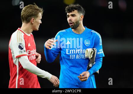 Arsenal's Martin Odegaard (right) and team-mates during a training ...
