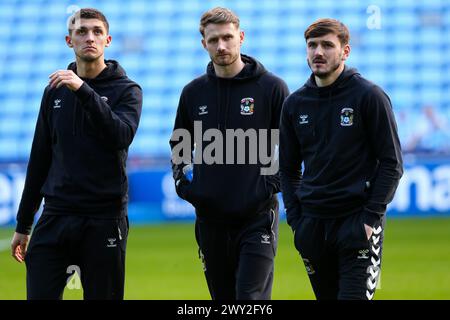 Coventry City's Bobby Thomas, goalkeeper Bradley Collins and Liam ...