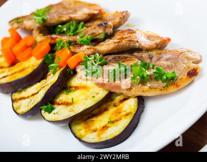 Mutton loin chops grilled with eggplant Stock Photo - Alamy
