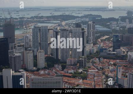 Aerial perspective view of Singapore downtown skyline with plenty of ...