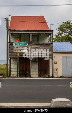 Deshaies, historic Caribbean wooden building of a street in Guadeloupe ...
