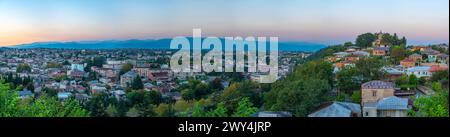 Aerial view of illuminated Kutaisi cityscape on Rioni River Stock Photo ...