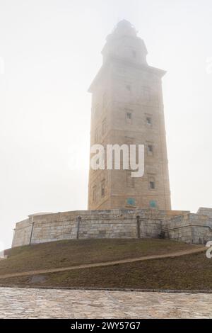 The Tower of Hercules building in heavy fog. The only Roman lighthouse ...