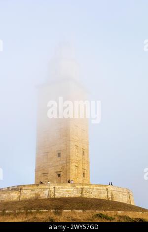 The Tower of Hercules building in heavy fog. The only Roman lighthouse ...
