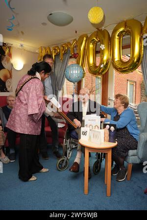 The Lord Mayor of Cardiff, Councillor Bablin Molik, (left), presents ...