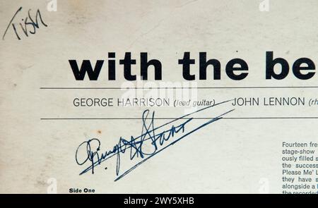 Fake autograph. With the Beatles LP record cover 'signed' by all four ...