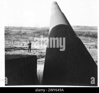 GERMAN CROSS-CHANNEL GUNS. - This soldier wanted a better view of the ...