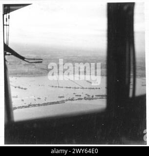 Aerial photographs document Mulberry B at Arromanches, a temporary port ...