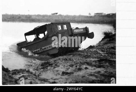 DEMONSTRATION OF AMPHIBIOUS VEHICLES - Weasel 29 crosses a swamp ...