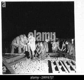 SAPPERS WORKING AT NIGHT ON BAILY BRIDGE - Sappers working to make a ...