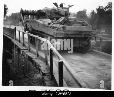 OUR ARMOUR CROSSES THE ORNE BRIDGE - Tanks crossing the river Orne by ...