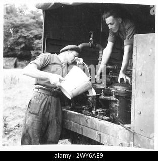 WITH 10 FIELD HYGIENE SECTION IN NORMANDY - S/Sergeant Howarth tests ...