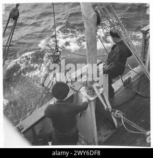 SWEEPING FOR MINES IN DANISH WATERS - Original wartime caption: Spray ...