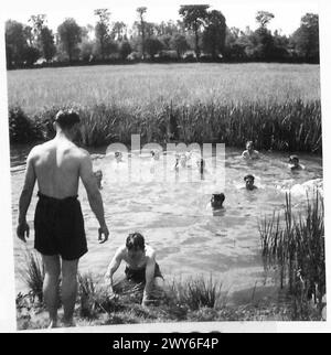 BRITISH TROOPS BATHE IN NORMANDY - British troops bathing in the river ...