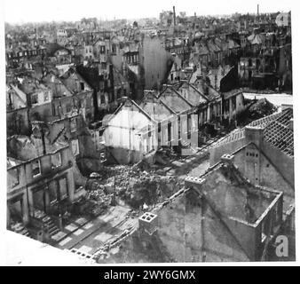 Buildings in Bremen show bomb damage during World War II. British Army ...