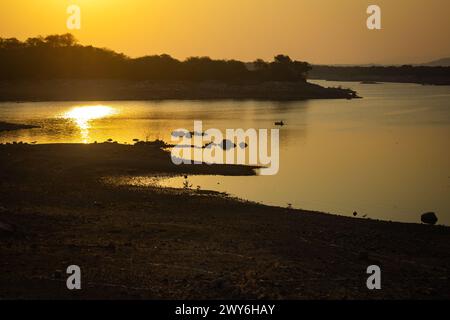 Scenic sunset view of water storage at Sathanur Dam which forms the ...