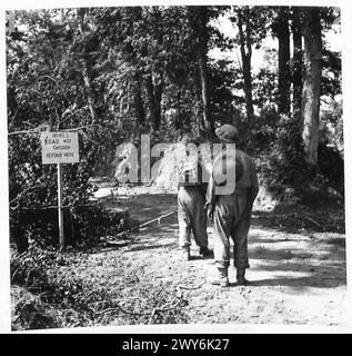 Royal Engineers of the British Army sweep a field for mines near ...