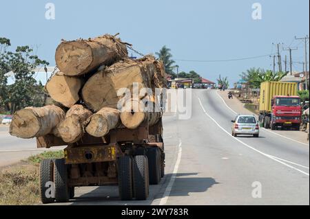 GHANA, Eastern region, Nkawkaw, timber transport on highway from Kumasi ...
