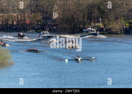 University Boat Race racing through Mortlake just before Chiswick ...