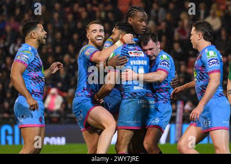 Harry Smith of Wigan Warriors celebrates his try during the 2025 ...