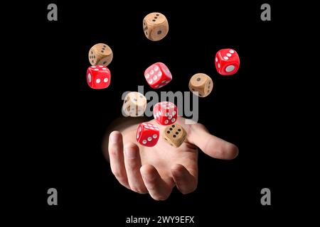 Man throwing dice on black background, closeup Stock Photo - Alamy