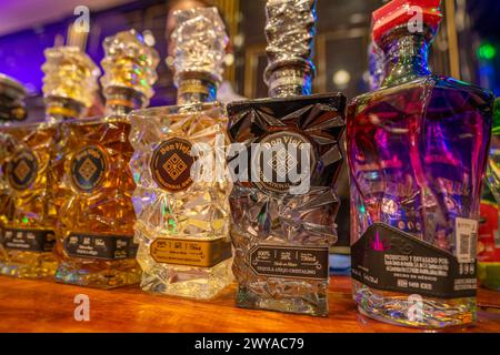 View of colourful Tequila bottles, Hotel Zone, Cancun, Caribbean Coast ...