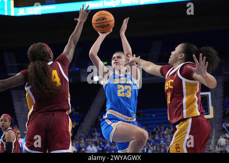 UCLA forward Gabriela Jaquez (11) runs onto the court before an NCAA ...