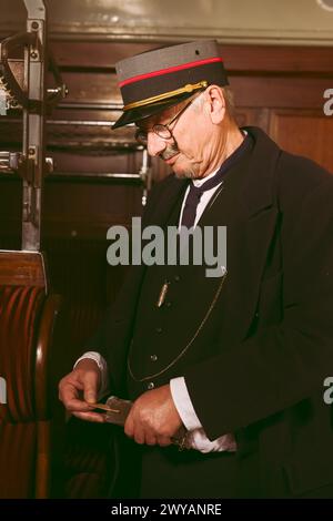 Reenactment scene of a vintage steam train conductor in a 1927 ...