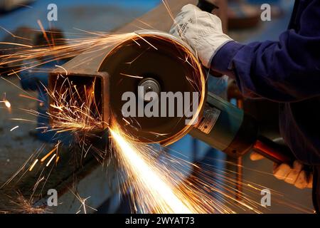 Cutting square hollow steel section, grinding machine with abrasive ...