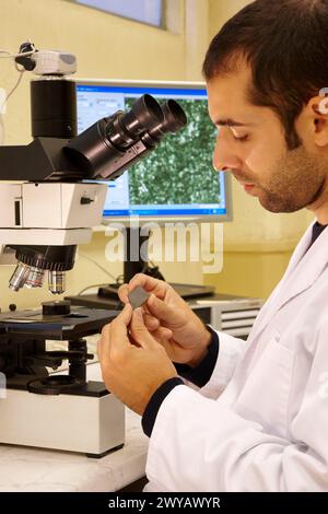 Structural analysis of steel, microscope, quality control laboratory ...