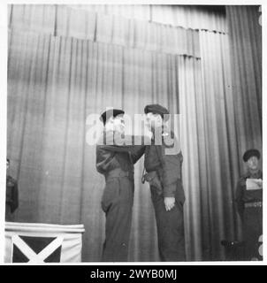 INVESTITURE 12 Corps Troops - Original wartime caption: T/Capt. J.B ...
