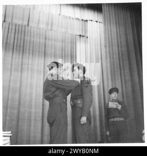 INVESTITURE 12 Corps Troops - Original wartime caption: L/Bdr. A.E ...
