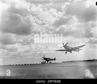 A long range fuel tank of a spitfire, converted to hold beer, is being ...