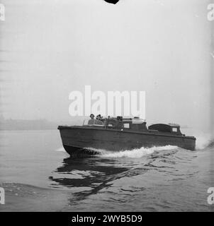 WOMEN'S ROYAL NAVAL SERVICE. - A Maintenance Wren works in navy blue ...