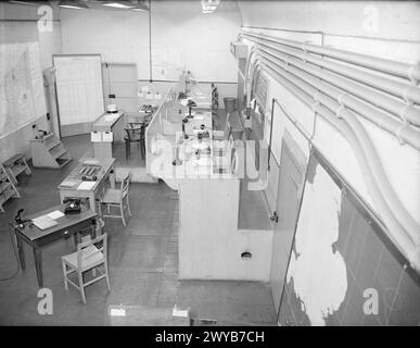 NAVAL PLOTTING AT DOVER. 17 APRIL 1945. - A scene in one of the ...