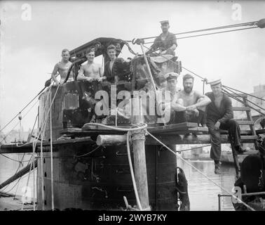 Crew on the conning tower of HMS Astute, the nuclear-powered submarine ...