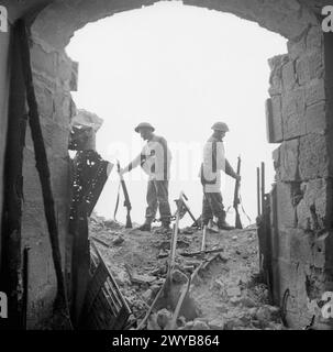 Troops of the 3rd Carpathian Rifles Division, 2nd Polish Corps, move ...