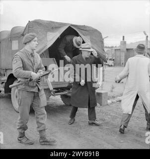 THE GREAT ROUND-UP - Captured Gestapo Agents are lined up inside the ...