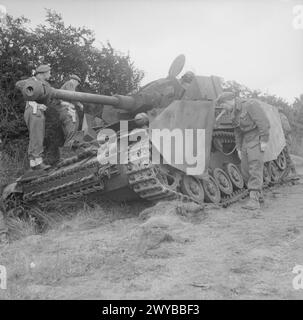 Crew of German soldiers near destroyed armored vehicle - 1941 ...