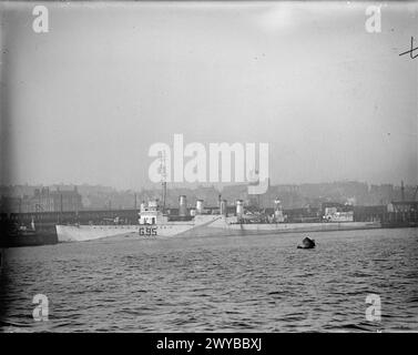 HMS Montgomery, formerly a US destroyer, is pictured at the jetty in ...