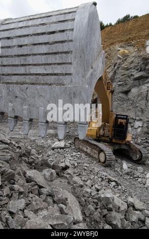 Extracting raw material from quarry for cement manufacturing Stock ...